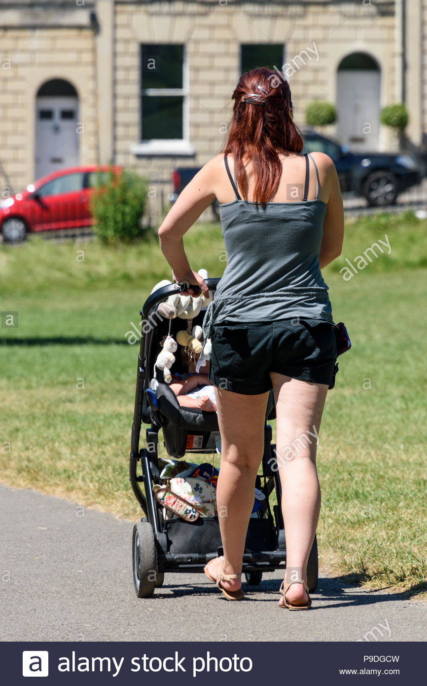 Woman Pushing A Pram Stock Photos & Woman Pushing A Pram Stock Images ...