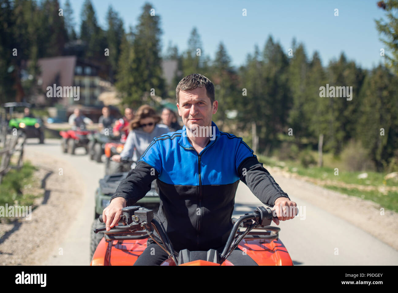 man riding atv vehicle on off road track ,people outdoor sport ...