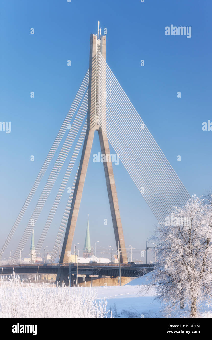 Cable-stayed bridge with a panoramic view of Riga in the winter Stock ...
