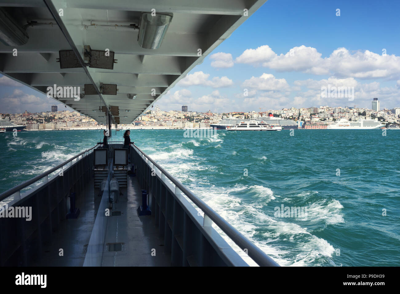 The ferry deck with reflection in the windows against the backdrop of ...