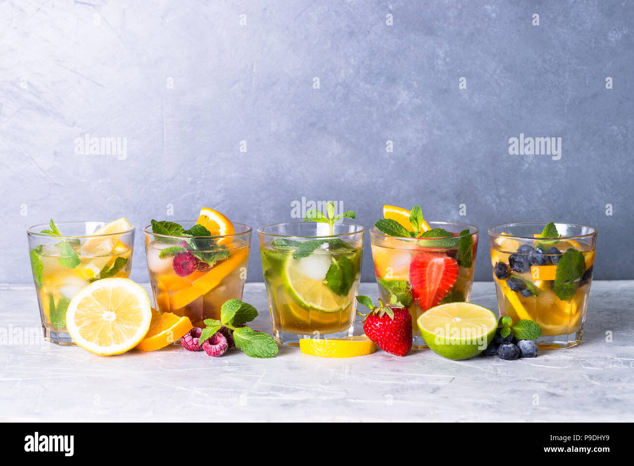 Lemonade set. Lemonade, mojito and berry lemonade in glasses Stock ...