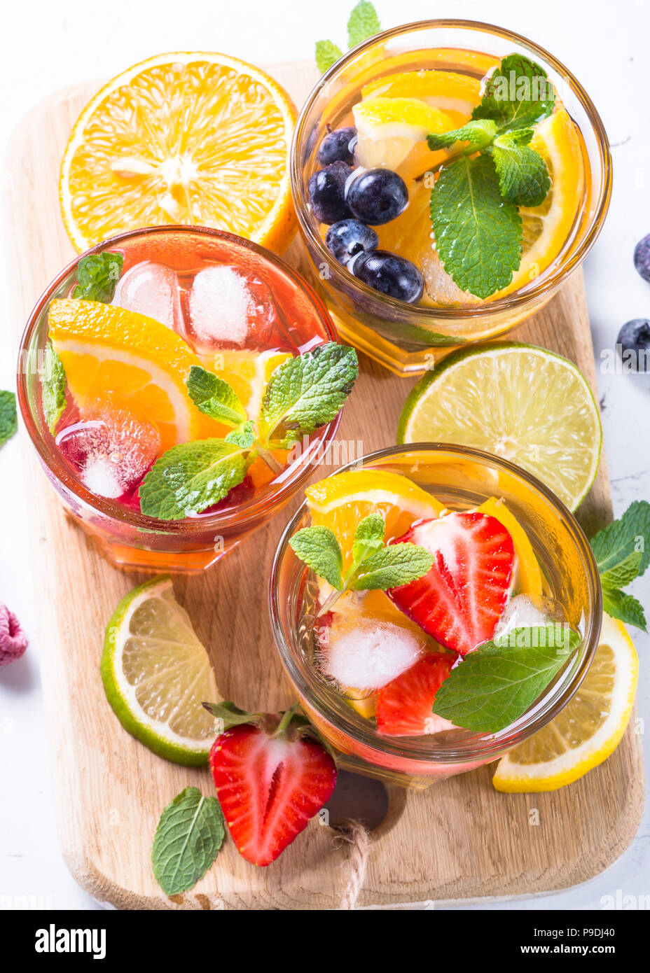 Lemonade set. Cold summer drink assortment. Lemonade, mojito and berry ...