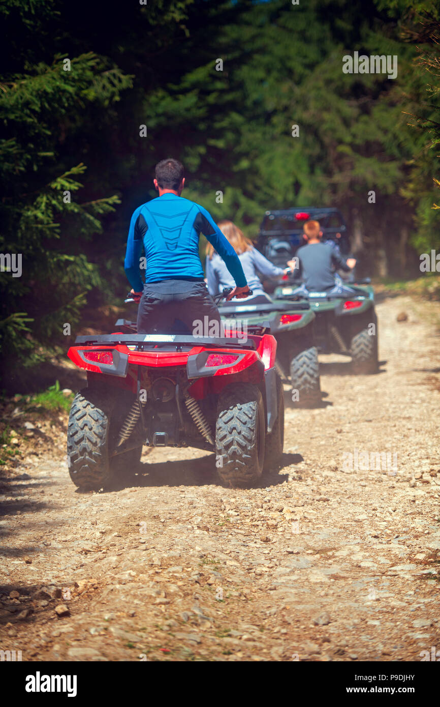 man riding atv vehicle on off road track ,people outdoor sport ...
