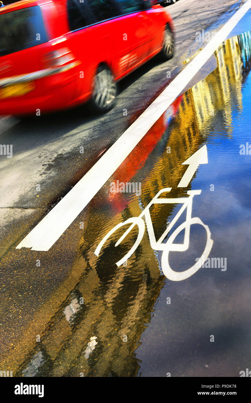 Sign of the water cycle paths on the street near the park with ...