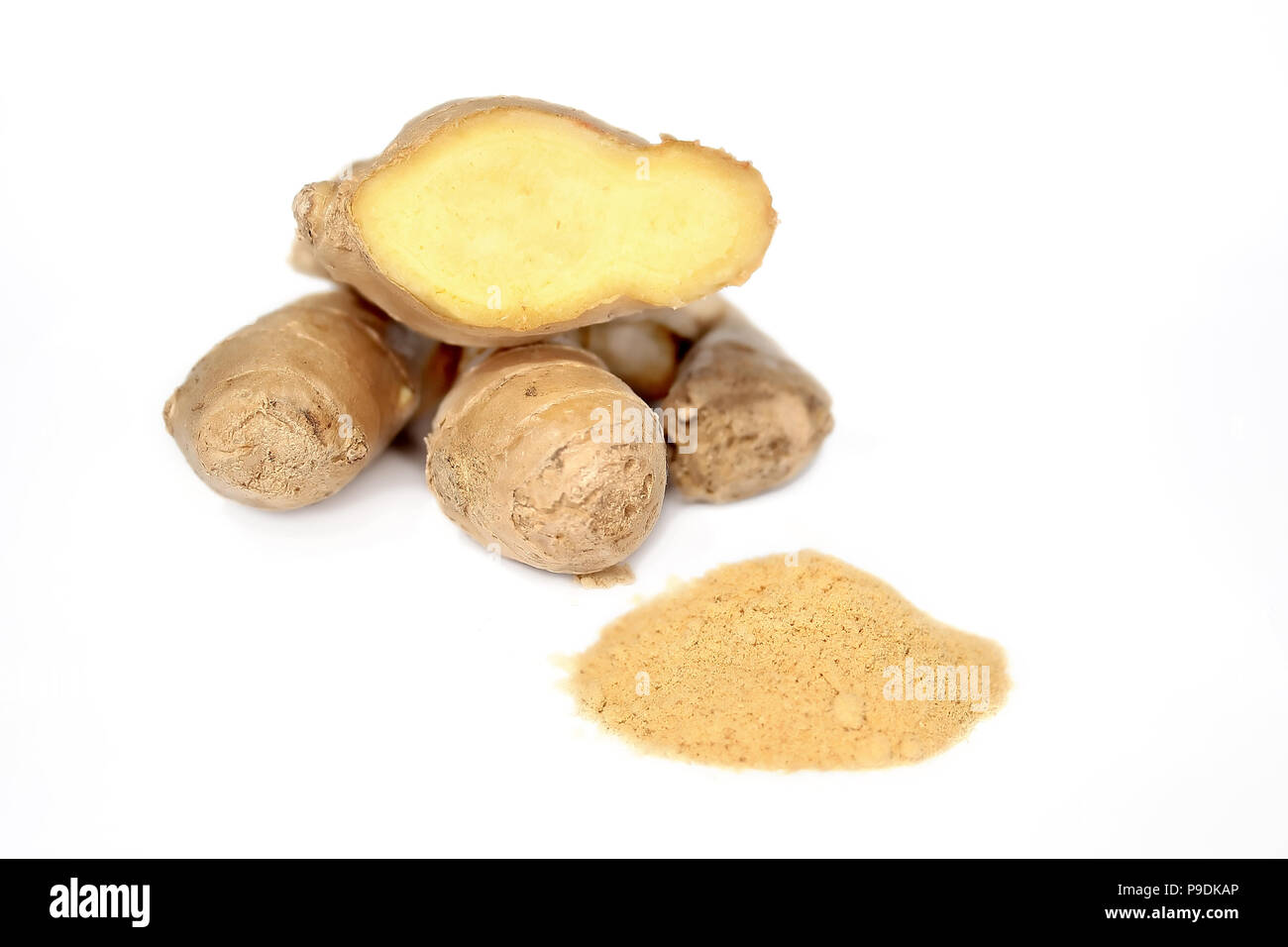 Fresh ginger root and ground ginger isolated spice on white background ...