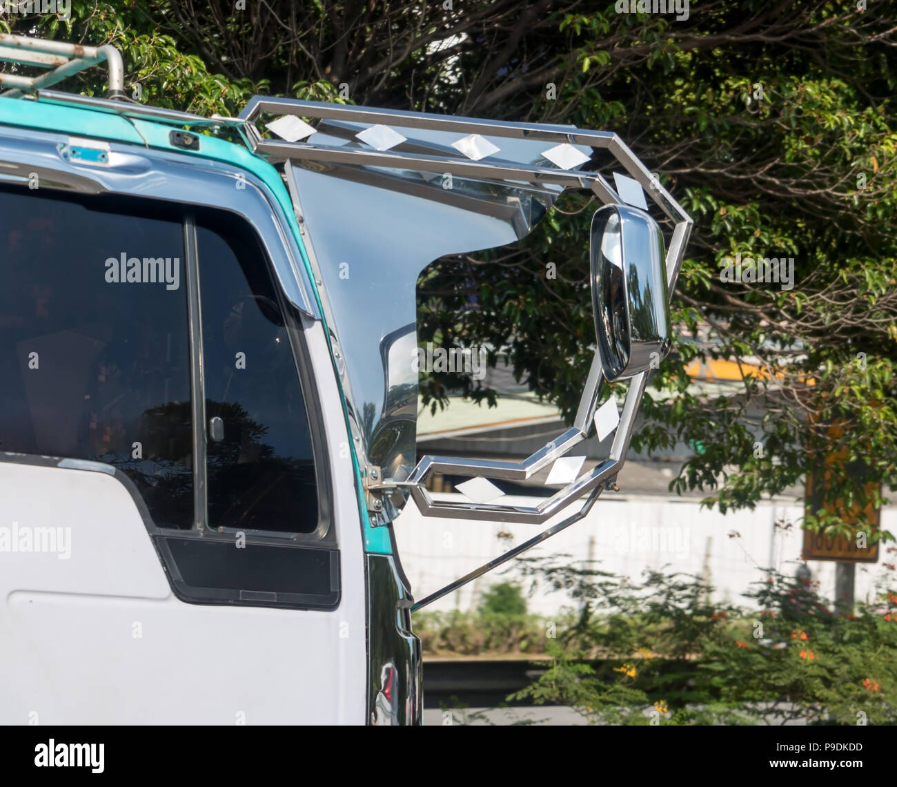 Decorative steel holder with rear-view mirror on the truck. Cabin of ...