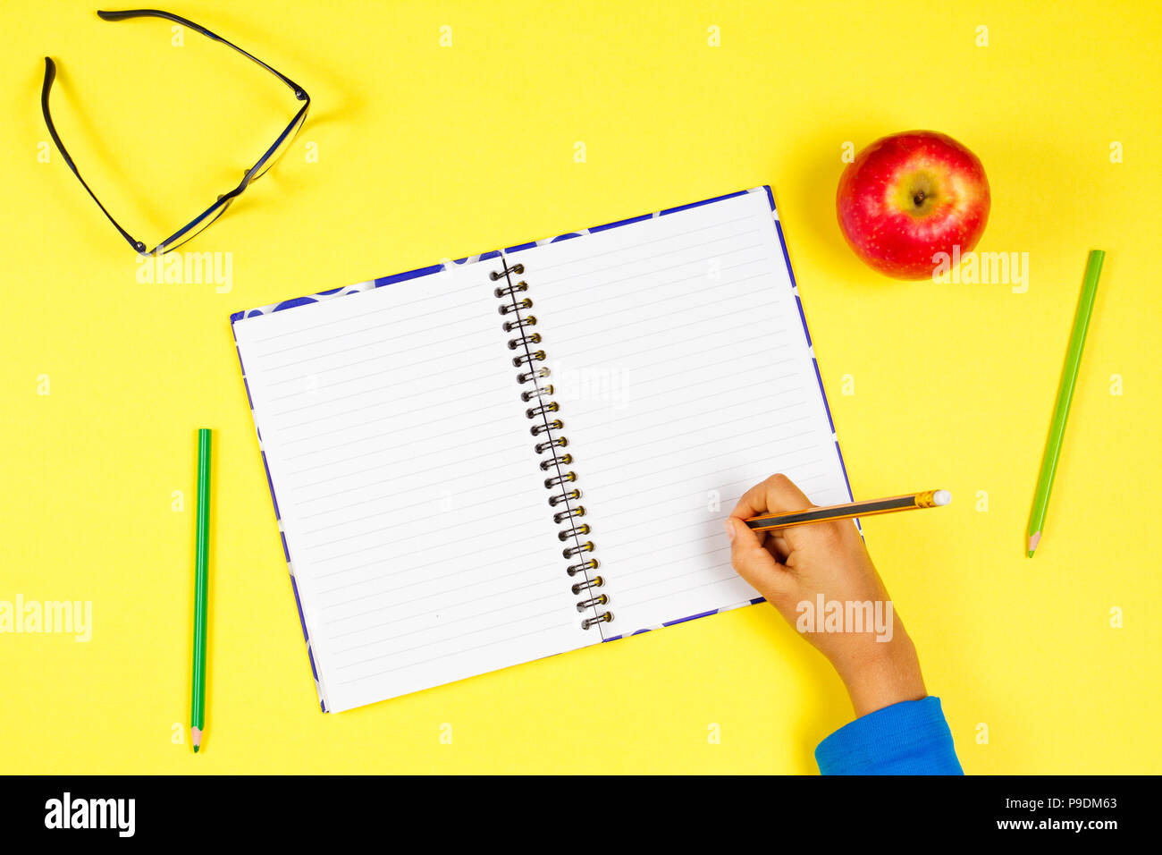 Child open book above desk hi-res stock photography and images - Alamy