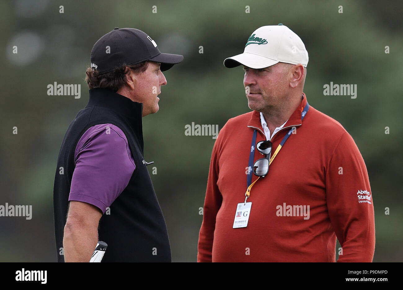 European Ryder Cup captain Thomas Bjorn speaks with USA's Phil ...