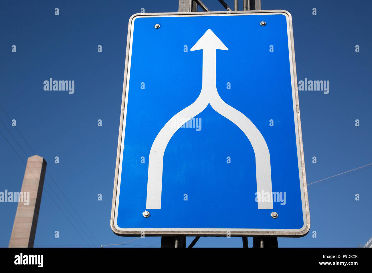 Merging road sign hi-res stock photography and images - Alamy