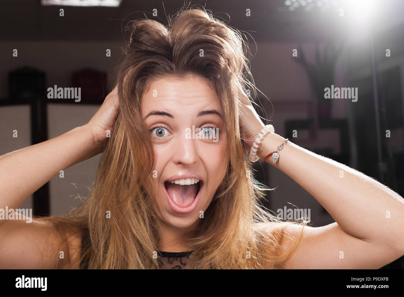Disheveled hairstyle hi-res stock photography and images - Alamy