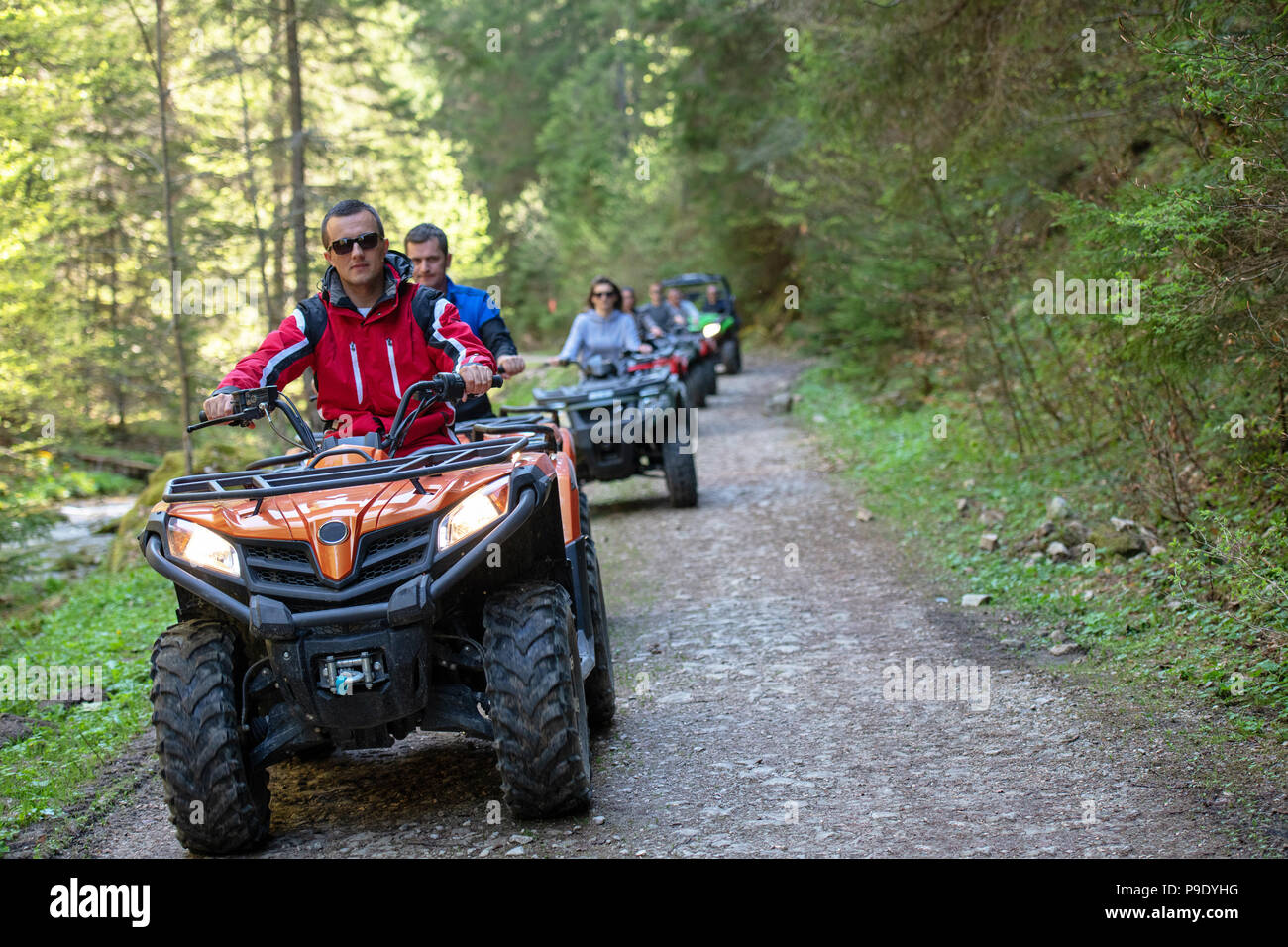 man riding atv vehicle on off road track ,people outdoor sport ...