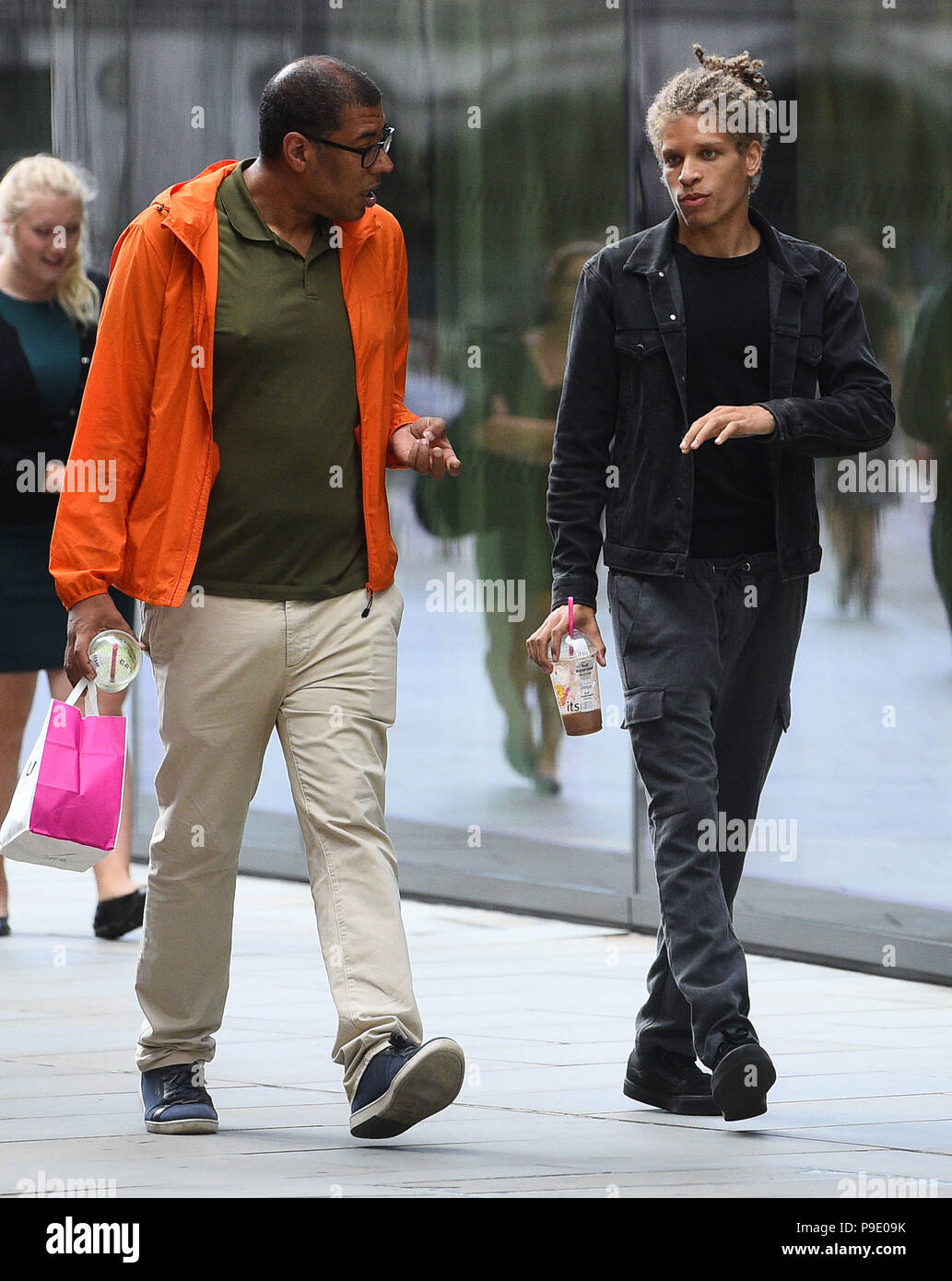 Model Chuck Achike (right) arrives at the Old Bailey in London to give ...