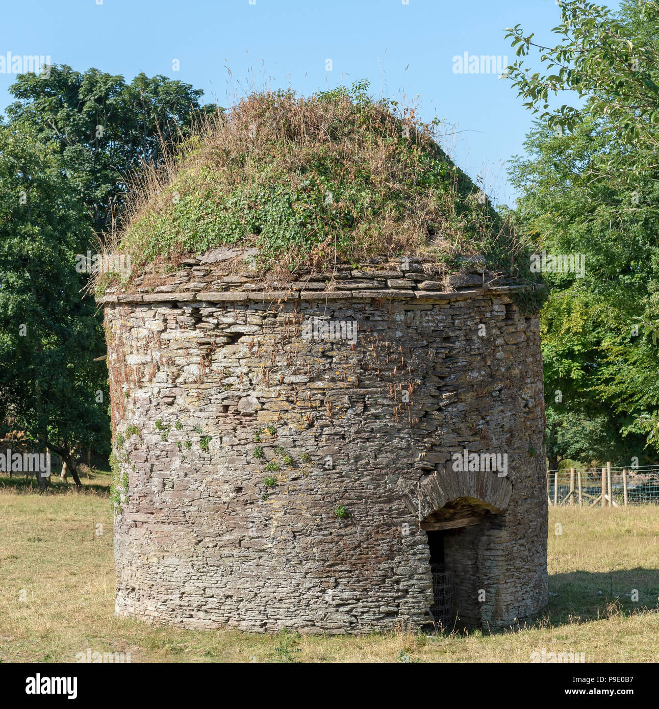 An old Dovecote for doves and pigeons standing in a Devonshire field ...