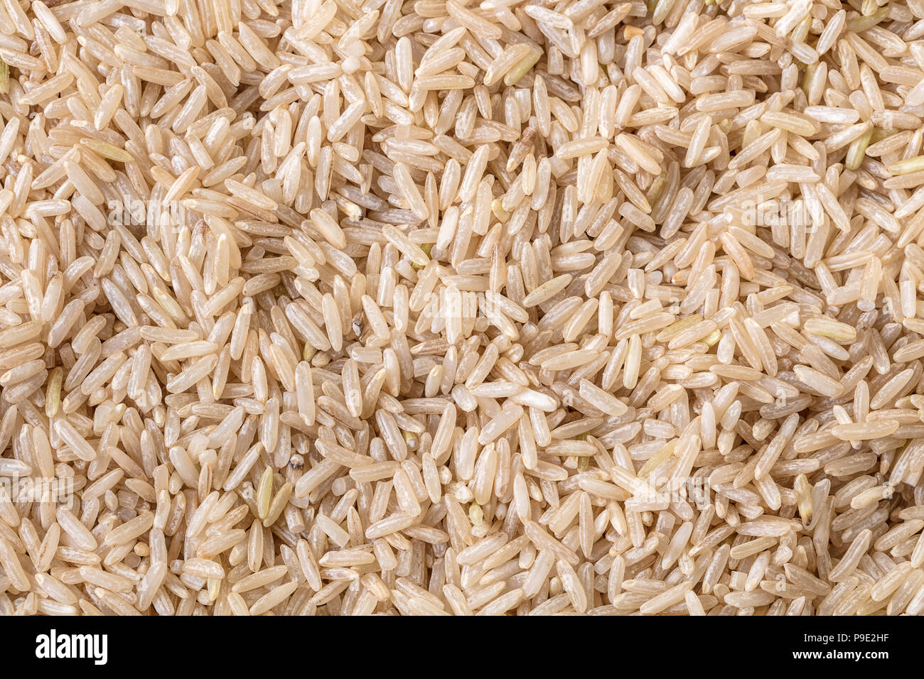 food background, texture unpolished rice brown close-up Stock Photo - Alamy