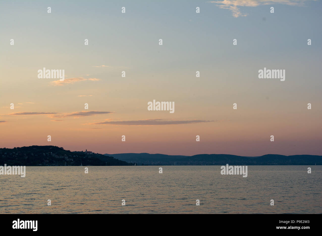 Beautiful sunset above the lake Balaton Stock Photo - Alamy