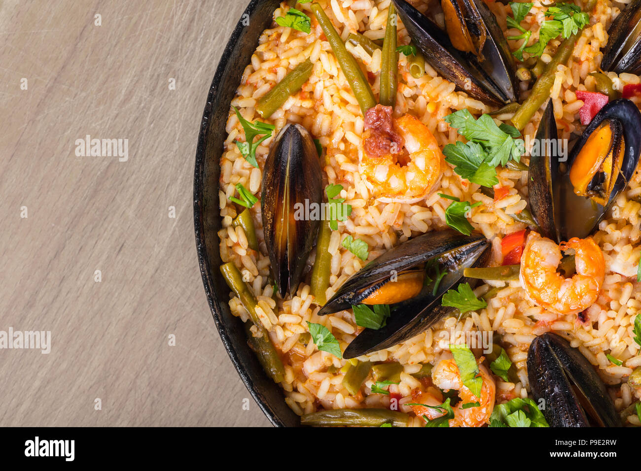 food background, paella with seafood and vegetables Stock Photo - Alamy