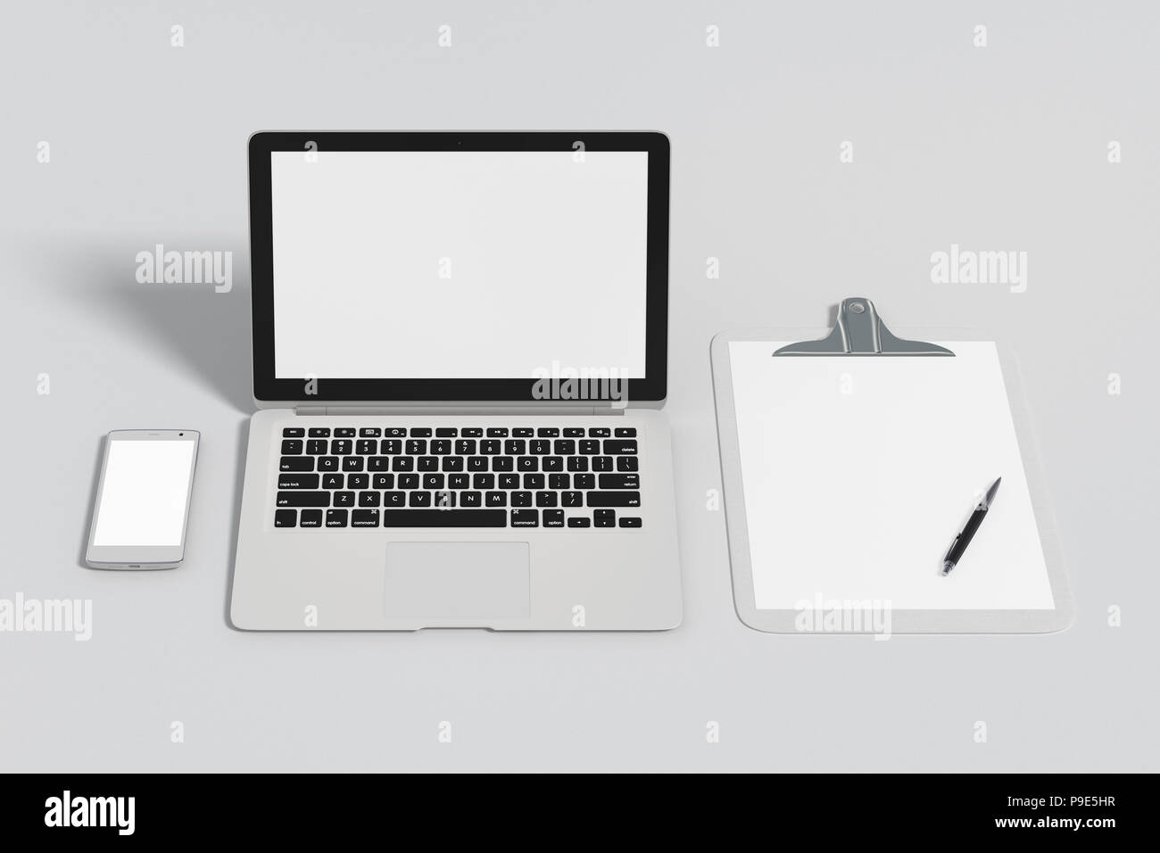 Blank screen laptop, smartphone and clipboard with pen isolated on ...