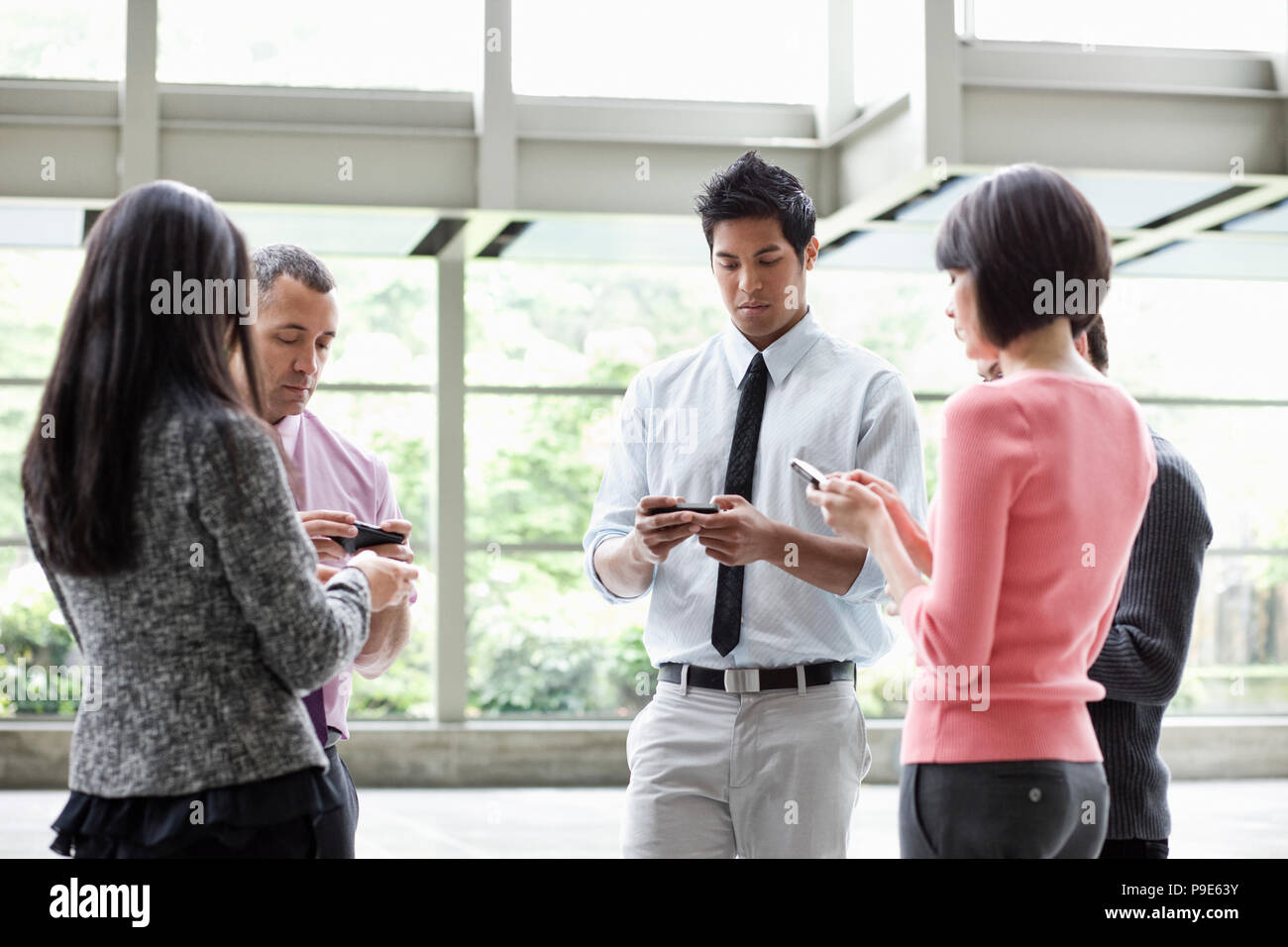 Mixed gender phones hi-res stock photography and images - Alamy