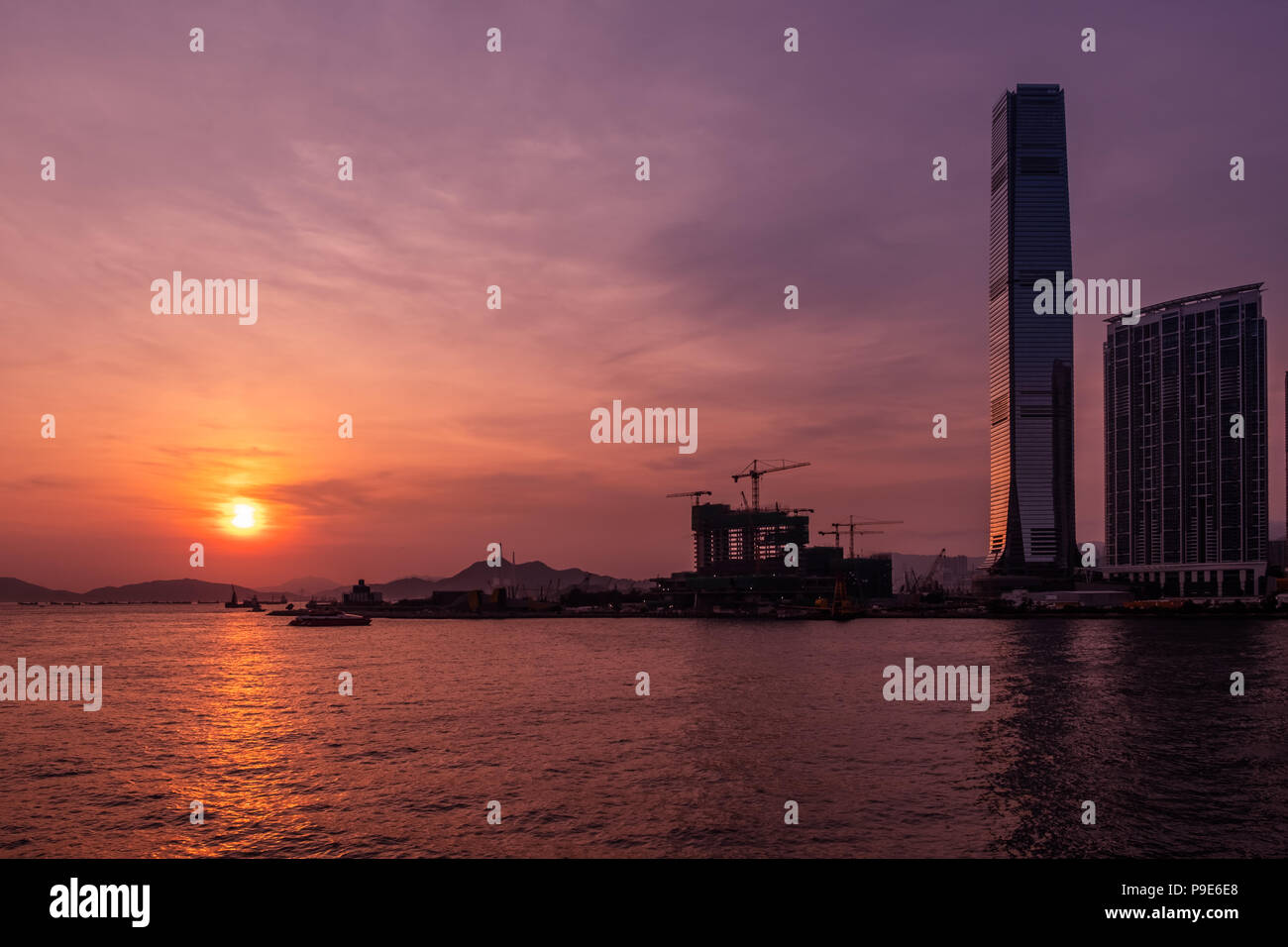 Sunset of Victoria Harbor of Hong Kong Stock Photo - Alamy