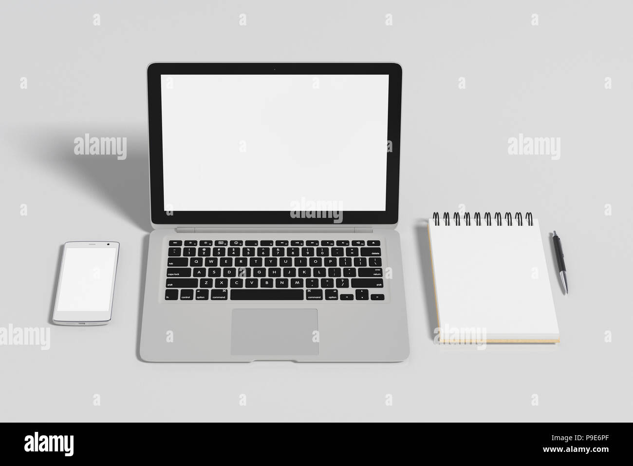 Blank screen laptop, smartphone and notepad with pen isolated on white ...
