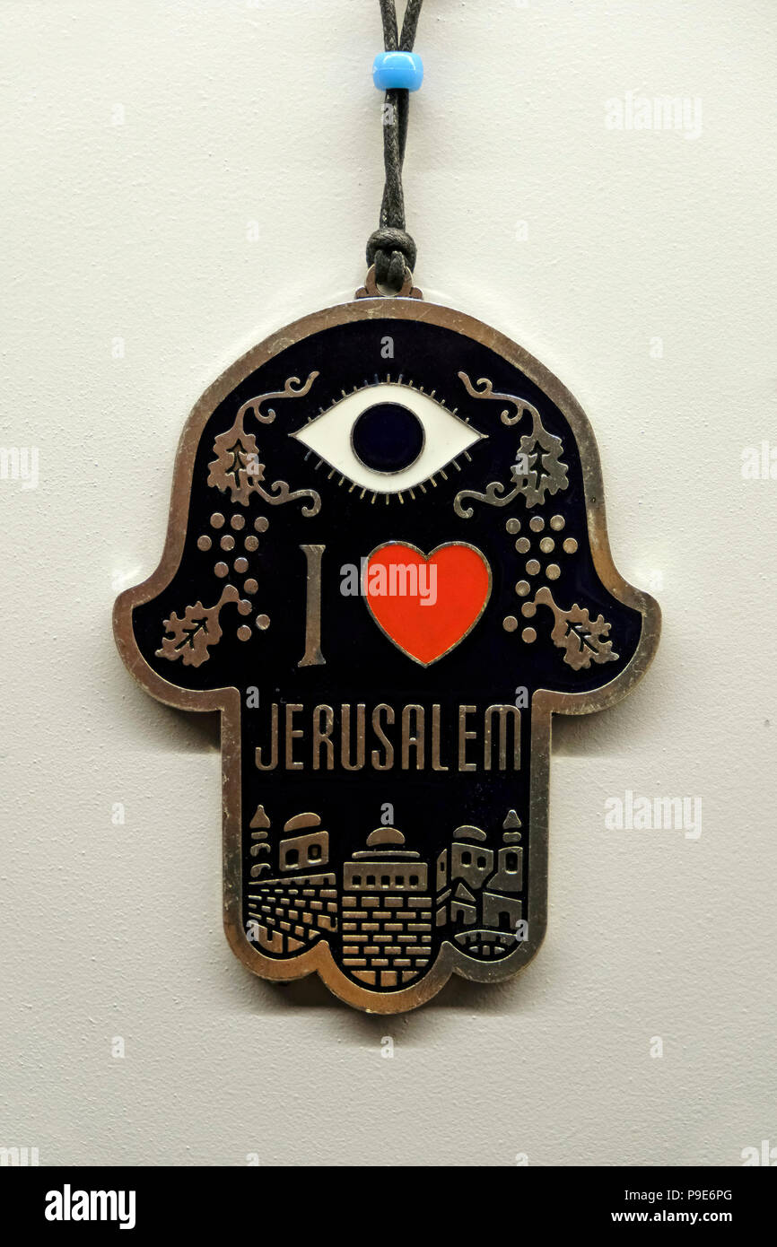 A palm-shaped Hamsa amulet with an inscription in English "I Love ...