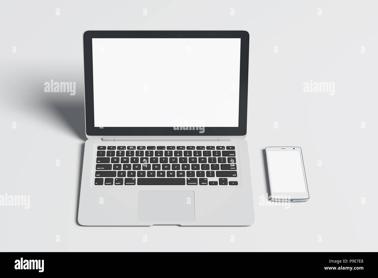 Blank screen laptop and smartphone isolated on white background with ...