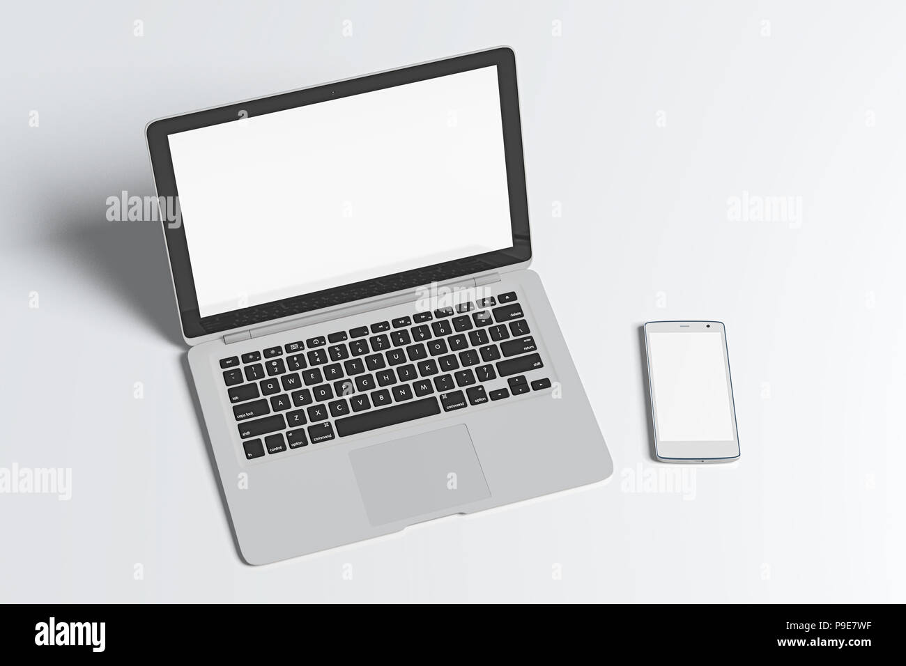 Blank screen laptop and smartphone isolated on white background with ...