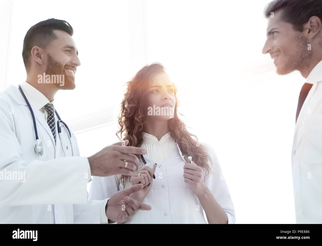 group of doctors discussing in hospital Stock Photo - Alamy
