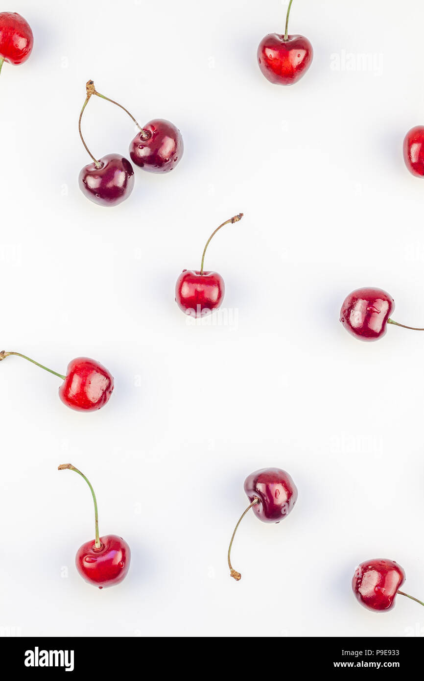 Creative top view of fresh ripe cherry pattern layout with copy space ...