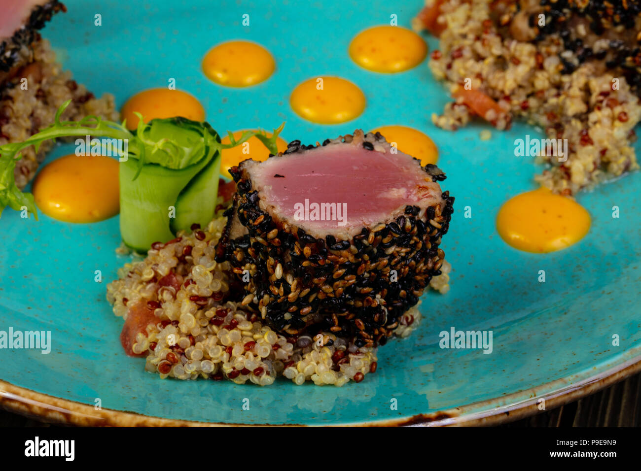 Roasted tuna fillet with cinoa Stock Photo - Alamy