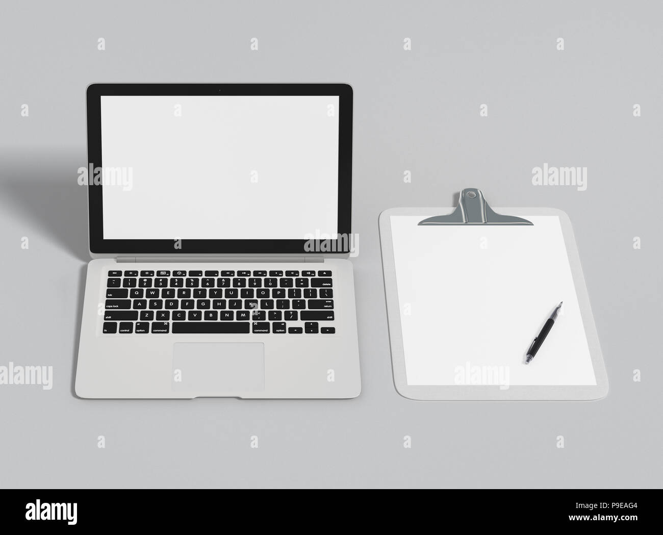 Blank screen laptop and clipboard with pen isolated on white background ...