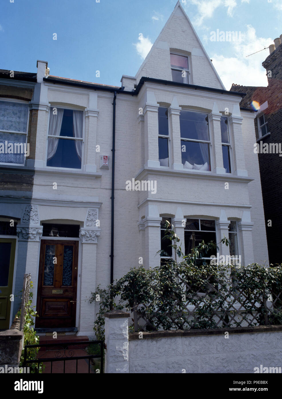 Exterior of cream painted Victorian townhouse Stock Photo - Alamy