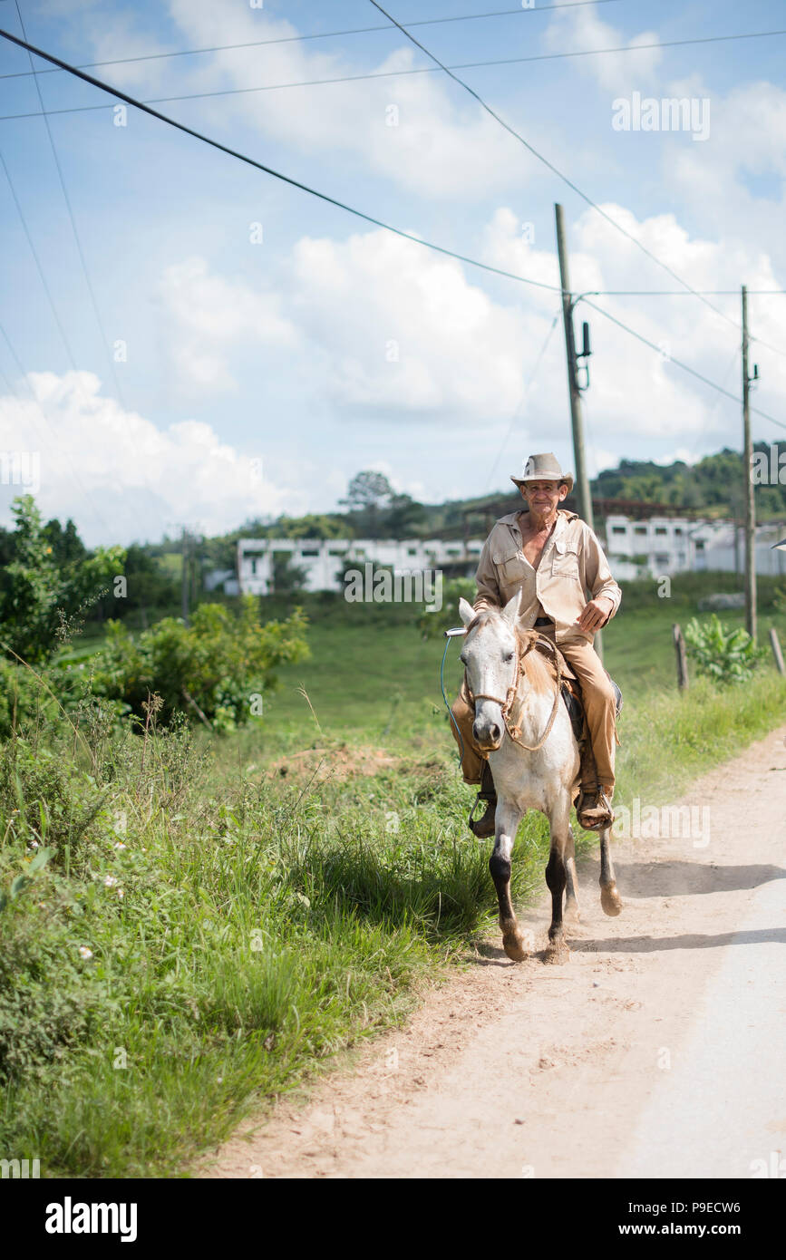 Man riding a horse in a town hi-res stock photography and images - Alamy