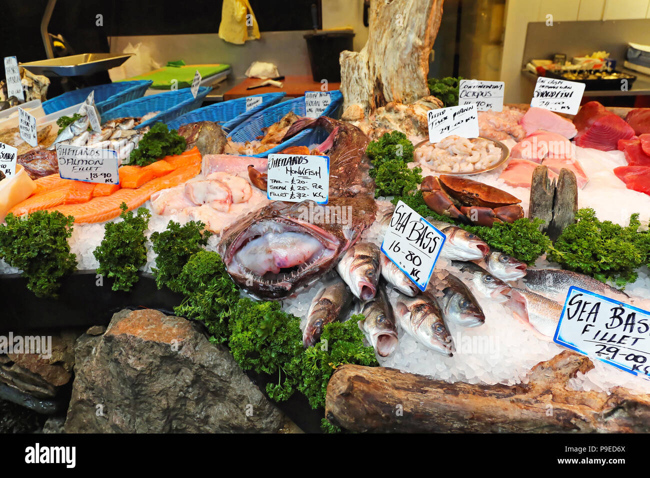 Fresh seafood at fish market stall Stock Photo - Alamy