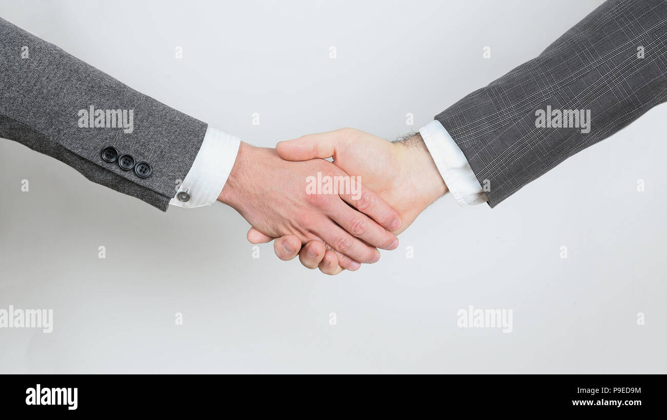 Two man in gray suits business handshake Stock Photo - Alamy