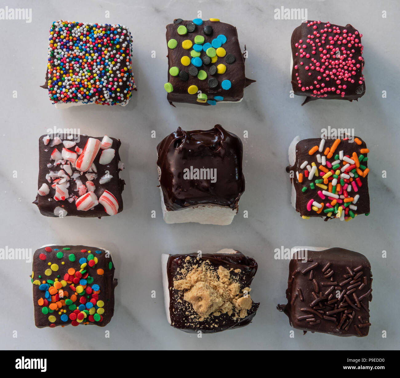 Nine Decorated Marshmallow Cubes in grid Stock Photo - Alamy