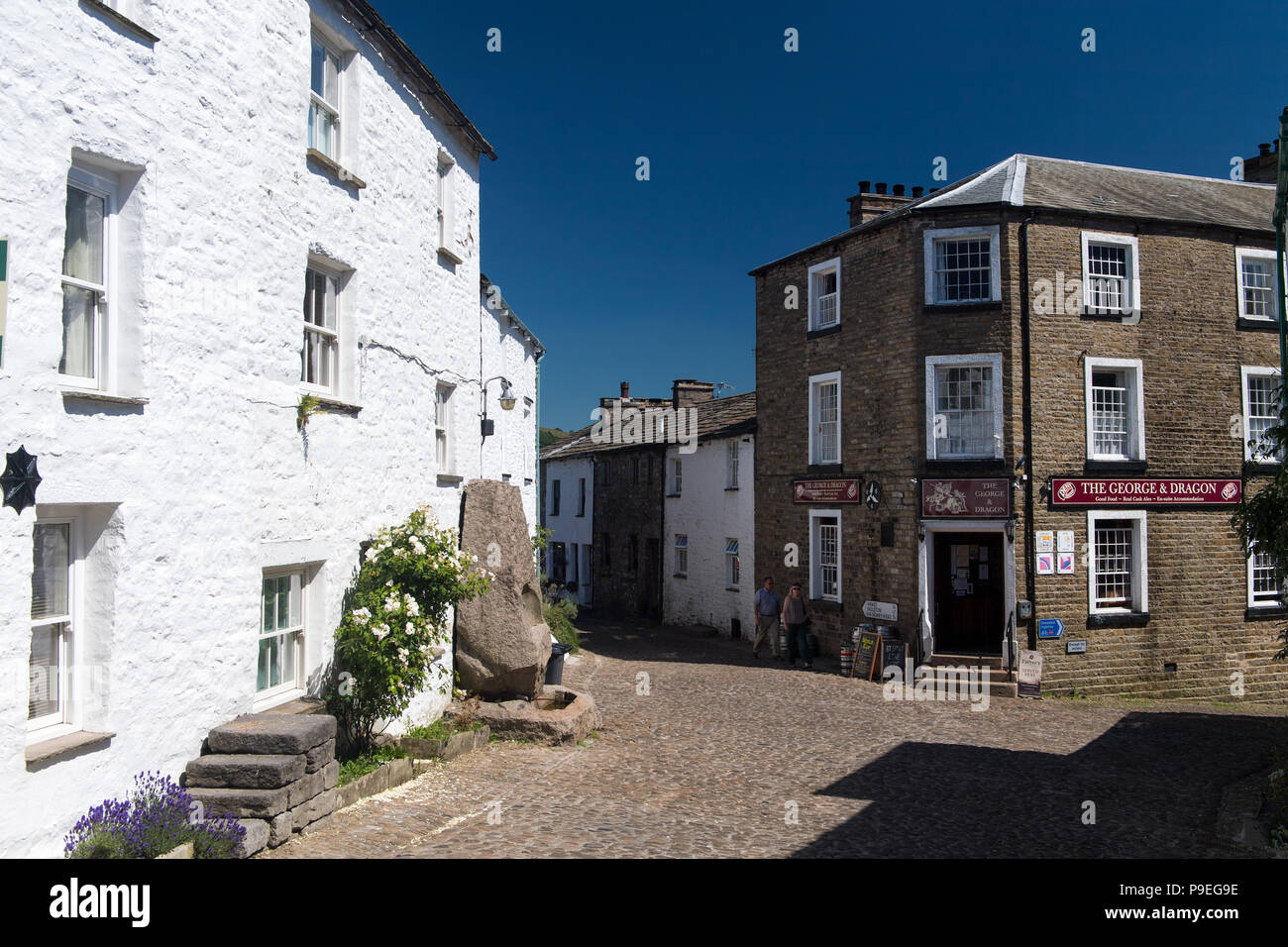 Cobbled main street of Dent village in the Yorkshire Dales National ...