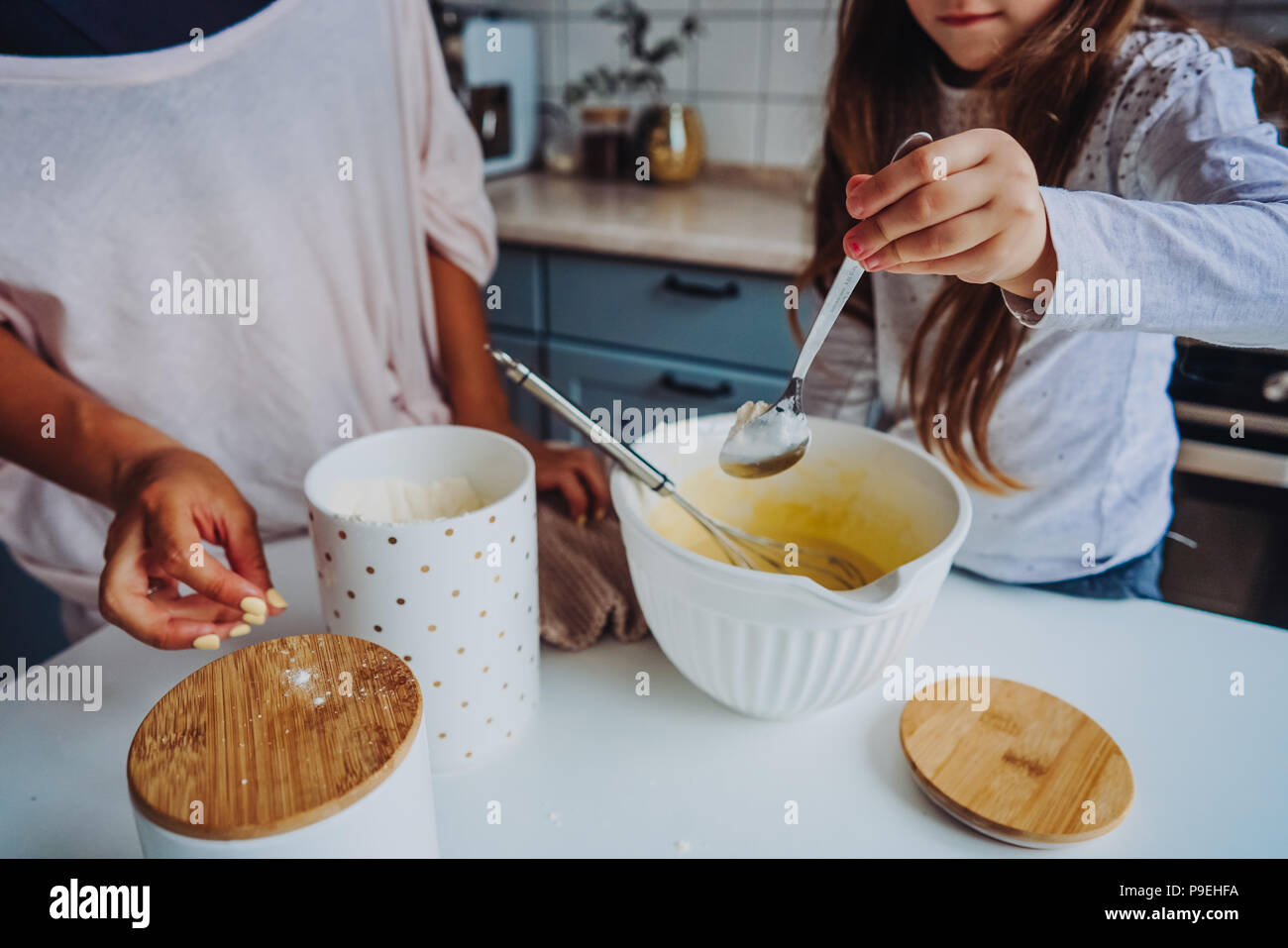 happy family cook together in the kitchen Stock Photo - Alamy