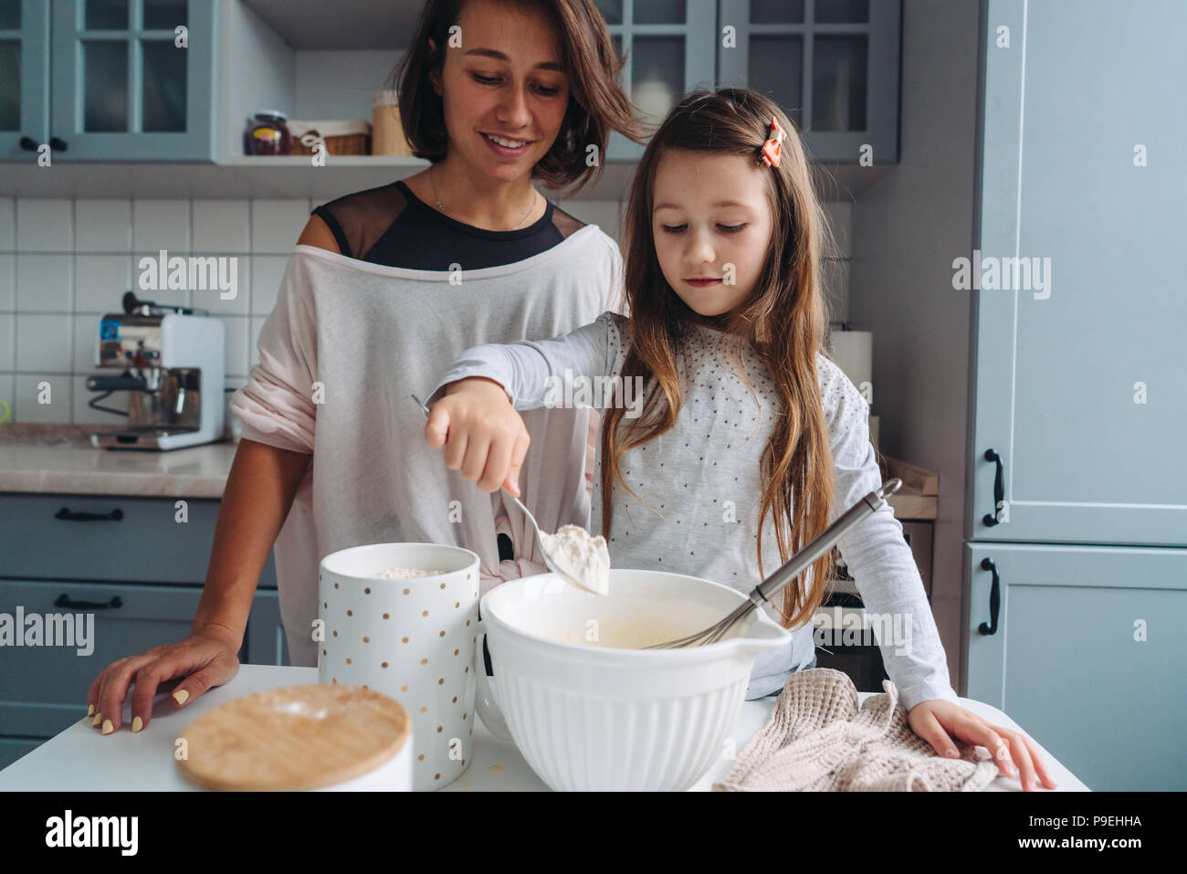 happy family cook together in the kitchen Stock Photo - Alamy