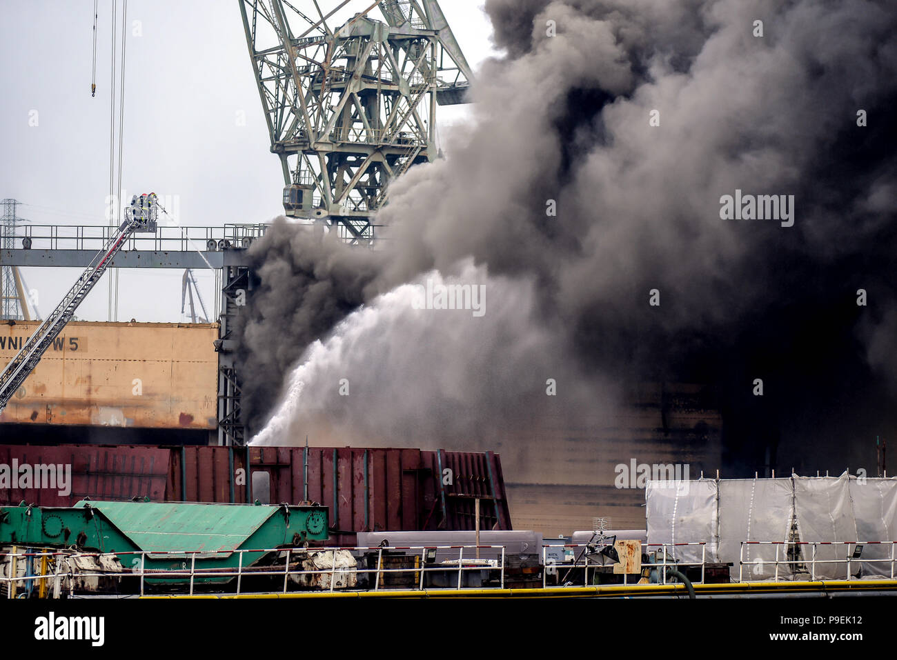 Fire bursts out in a warehouse of the Nauta Shipyard on July 17, 2018 ...