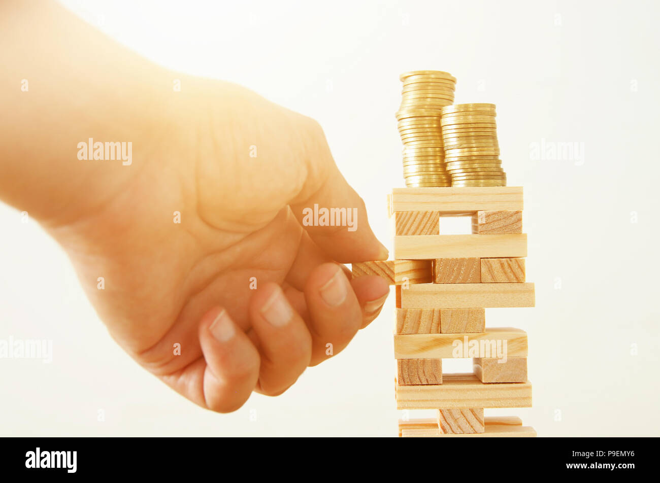 Insurance hands protect domino hi-res stock photography and images - Alamy