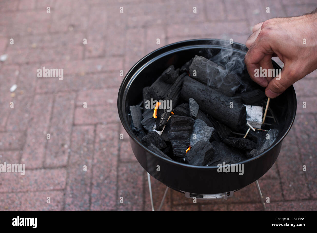 An open brazier for cooking meat. Copy space Stock Photo - Alamy