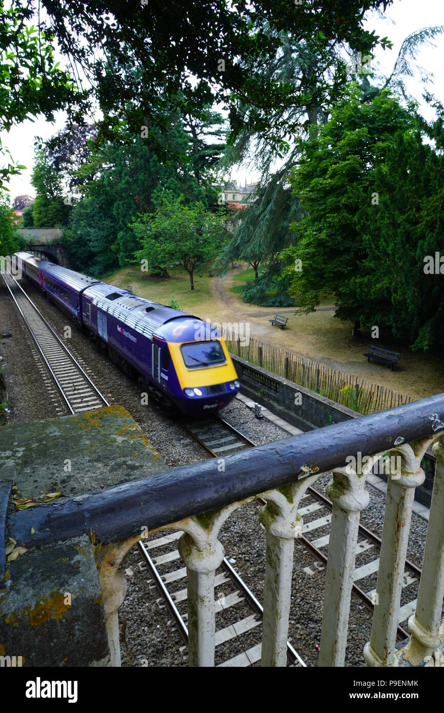 A view of a train going under a bridge in Bath, UK. Photo date: Friday ...