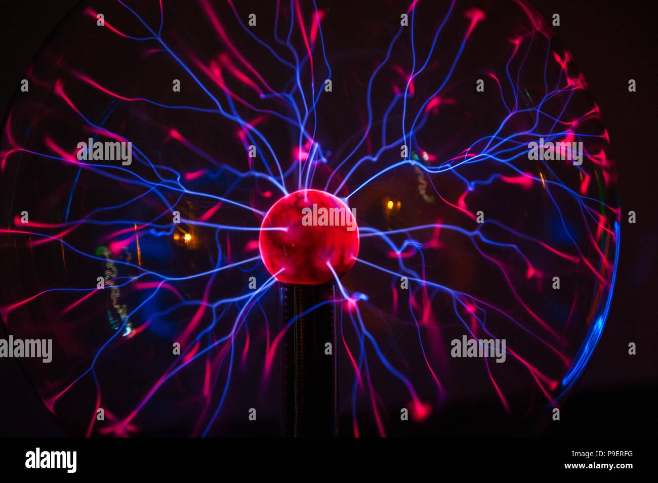 Electric plasma in glass sphere Stock Photo - Alamy