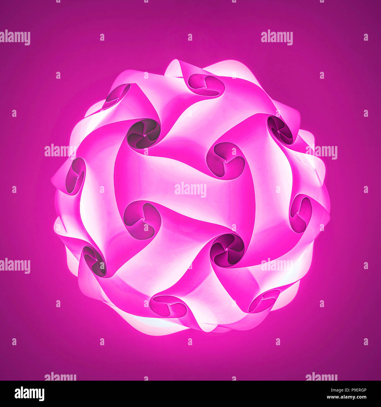 Glowing polygon lampshade. Geometric pattern. Pink light Stock Photo ...