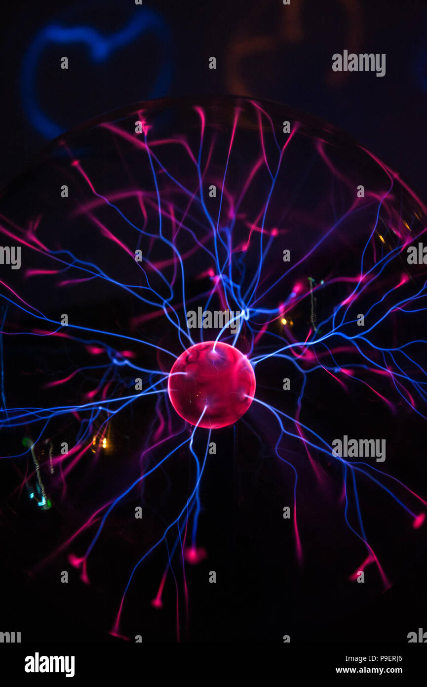 Electric plasma in glass sphere Stock Photo - Alamy