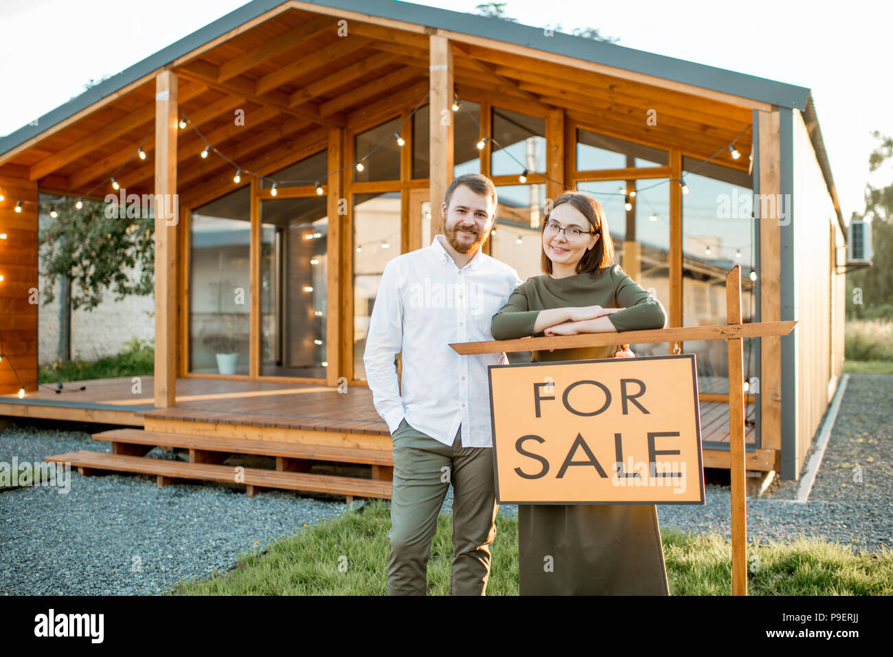 Couple selling country house Stock Photo - Alamy