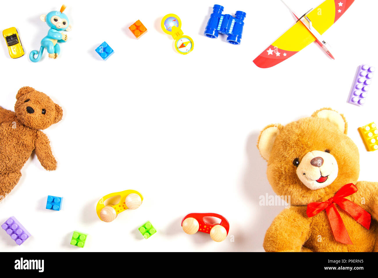 Colorful kids toys frame on white background. Top view, flat lay Stock ...