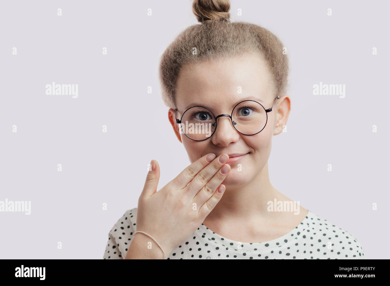 Sorry. emotional girl with hand on lips. Omg pleasant girl has spilled ...