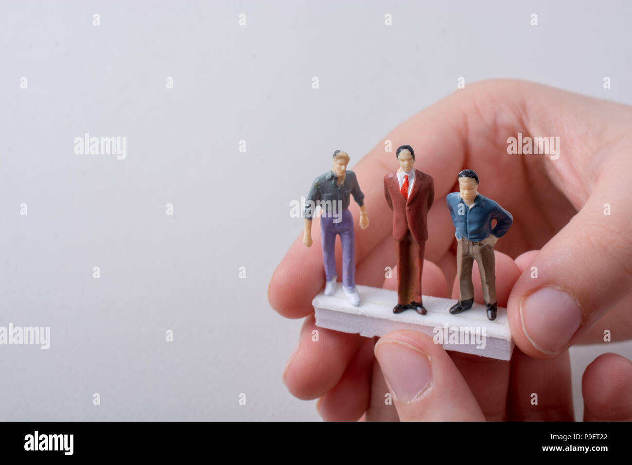Tiny figurine of man miniature model in view Stock Photo - Alamy